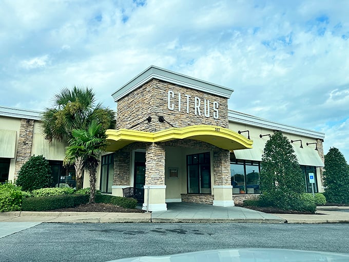 Citrus welcomes hungry visitors with its distinctive stone facade and cheerful yellow awning—like sunshine beckoning you to breakfast paradise.