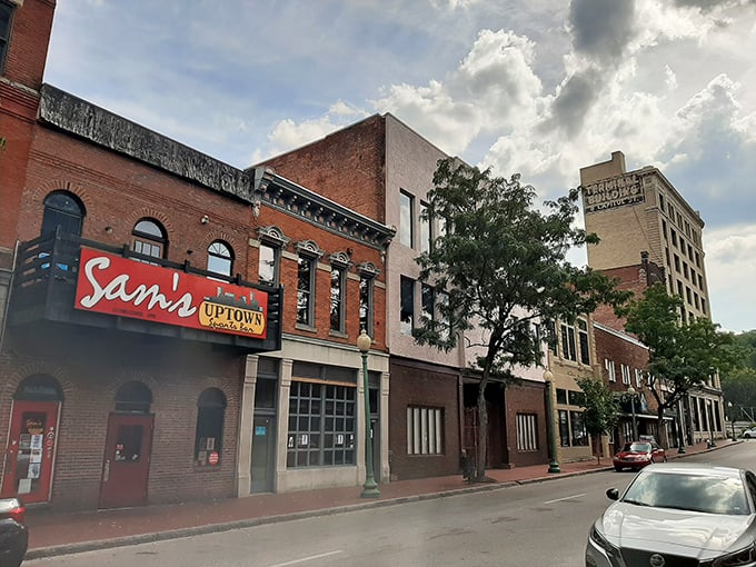 The iconic red sign of Sam's Uptown beckons like a culinary lighthouse on Washington Street, promising good times and even better food in downtown Charleston.