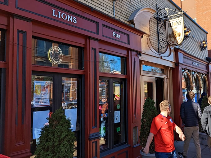 The iconic red facade of Three Lions Pub beckons like a British embassy on Wisconsin soil, promising authentic flavors and football matches on the telly.
