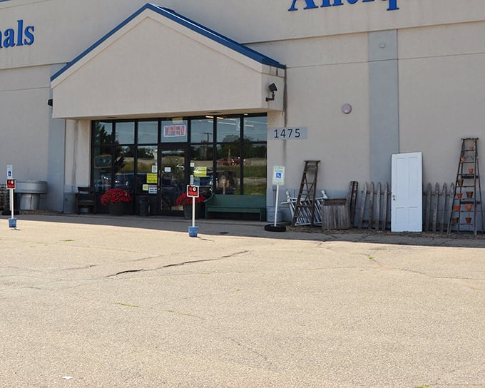 The unassuming exterior belies the wonderland within—like finding a portal to the past hiding in plain sight at a Wisconsin strip mall.