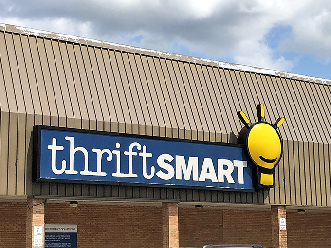 That cheerful yellow lightbulb logo isn't just cute branding—it's the universal symbol for "Eureka! You're about to find something amazing" at ThriftSmart.
