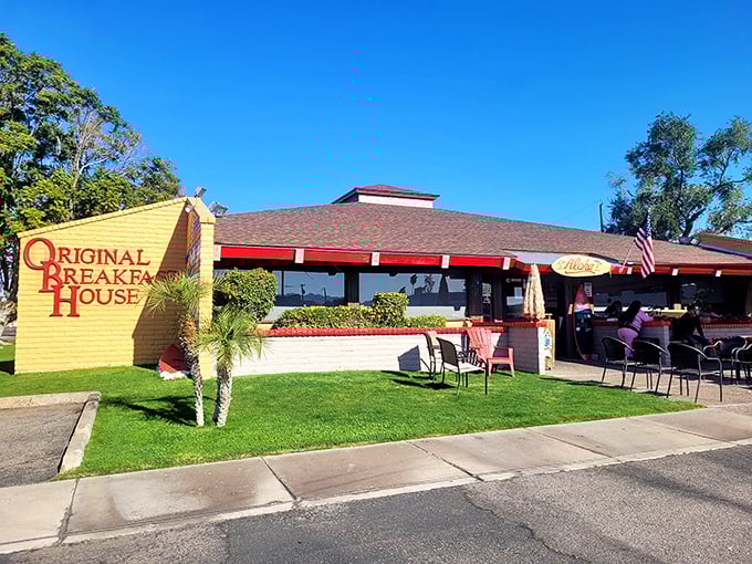 The thatched umbrella and "Aloha" sign promise a tropical escape, while the American flag reminds you this is breakfast patriotism at its finest.