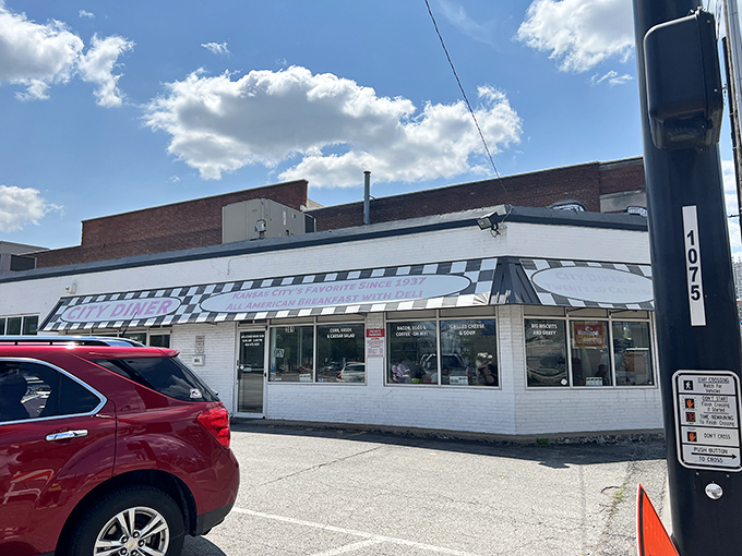The classic black-and-white checkered awning isn't trying to be retro—it just is. City Diner stands as a beacon of breakfast hope in Kansas City.
