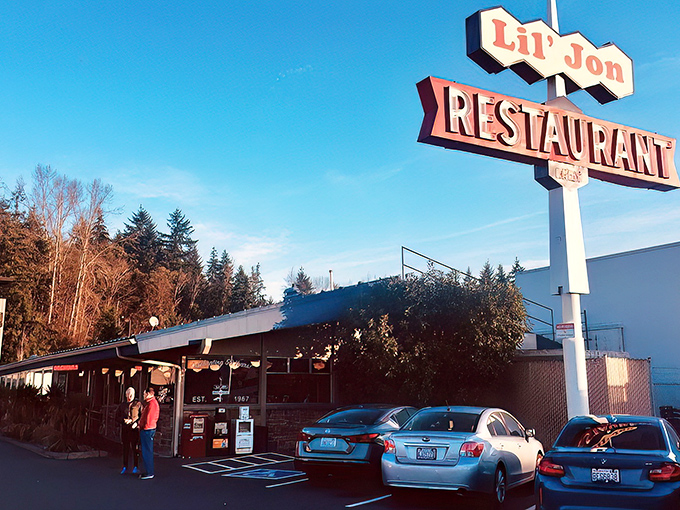 That vintage sign isn't just a beacon for hungry travelers—it's a time machine to when breakfast was affordable and Instagram didn't dictate our food choices.