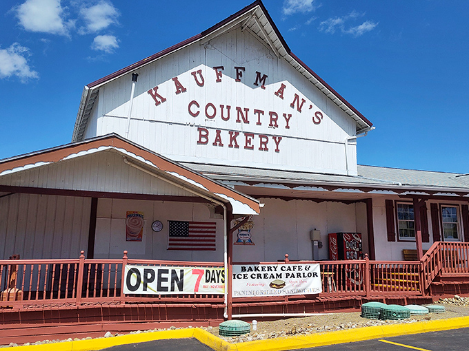 The white clapboard building with red trim stands like a beacon of carb-based hope in Amish Country. Open seven days? That's divine intervention.