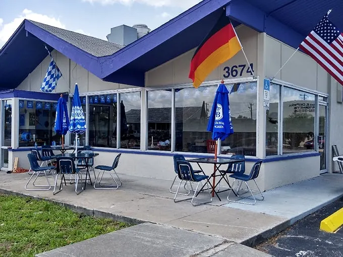 The unassuming exterior of HJ German Corner stands like a Bavarian embassy on Fort Myers' Cleveland Avenue—proof that culinary treasures often hide in plain sight.