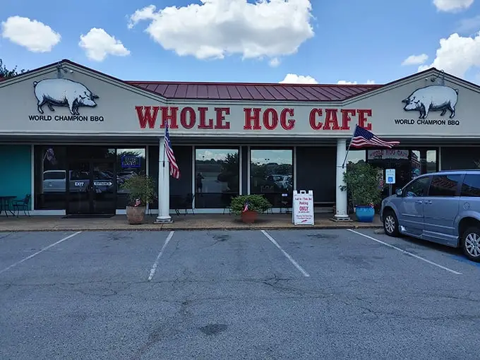 The unassuming facade of Whole Hog Cafe proudly announces its "World Champion BBQ" status—like a poker player who doesn't need to bluff.