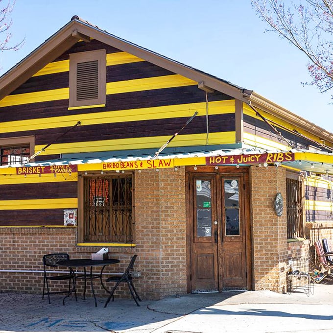 The unmistakable yellow-and-black striped exterior of The Joint beckons like a barbecue lighthouse in New Orleans' Bywater neighborhood. Hot and juicy ribs, indeed!