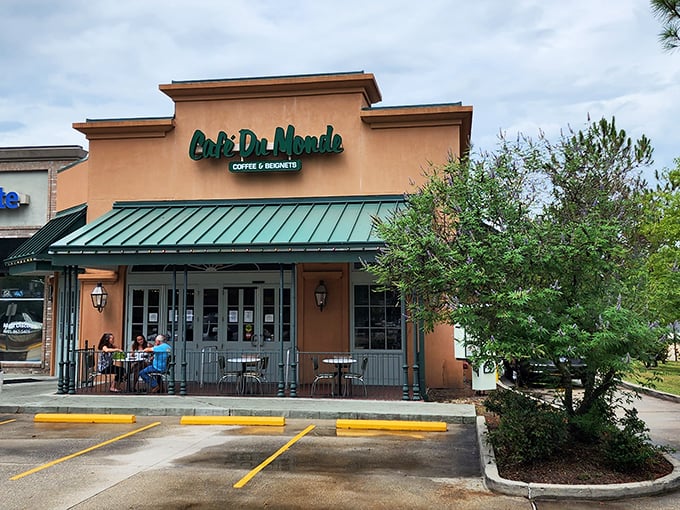 The iconic green-and-white awning beckons like a sugary lighthouse on the Northshore. Cafe Du Monde's Covington outpost delivers all the powdery magic without the French Quarter parking drama.
