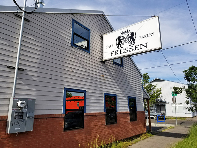 Fressen's charming exterior welcomes you with rustic wooden accents and a covered patio—like finding a secret European café tucked away in Northeast Portland.