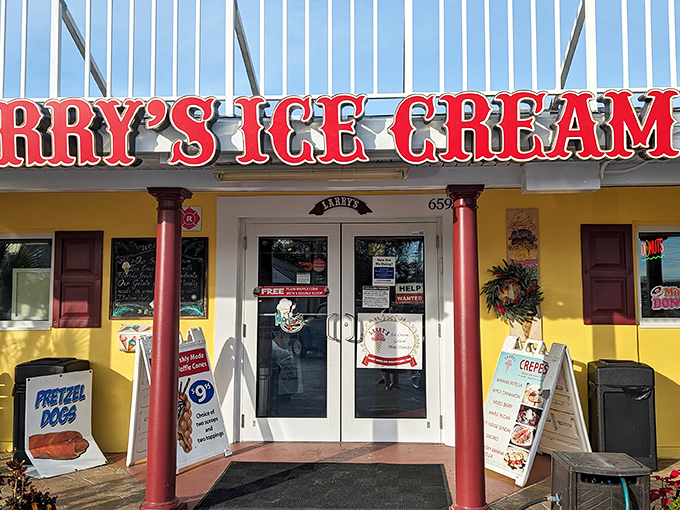 The cheerful yellow facade of Larry's beckons like a dessert lighthouse, promising sweet salvation from Florida's relentless heat.