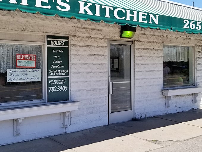 The unassuming exterior of Kate's Kitchen might not stop traffic, but locals know this humble white building houses breakfast magic worth any detour.