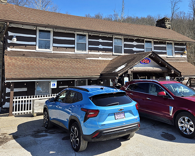 The Log Cabin Inn's exterior is exactly what Kentucky comfort food deserves—authentic log construction that promises zero pretension and maximum flavor.