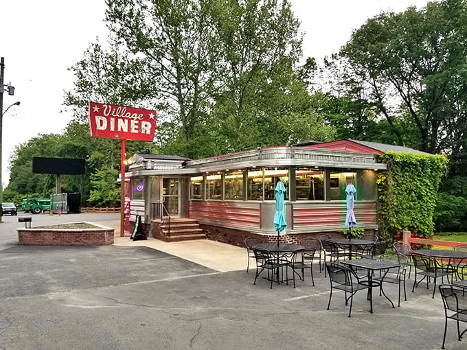 That iconic red sign against the blue Pennsylvania sky isn't just a diner marker – it's a beacon of hope for the breakfast-desperate traveler.