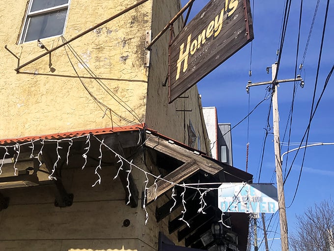 That weathered wooden sign hanging above Honey's entrance isn't just decoration—it's a beacon for breakfast enthusiasts seeking Philadelphia's best-kept culinary secret.