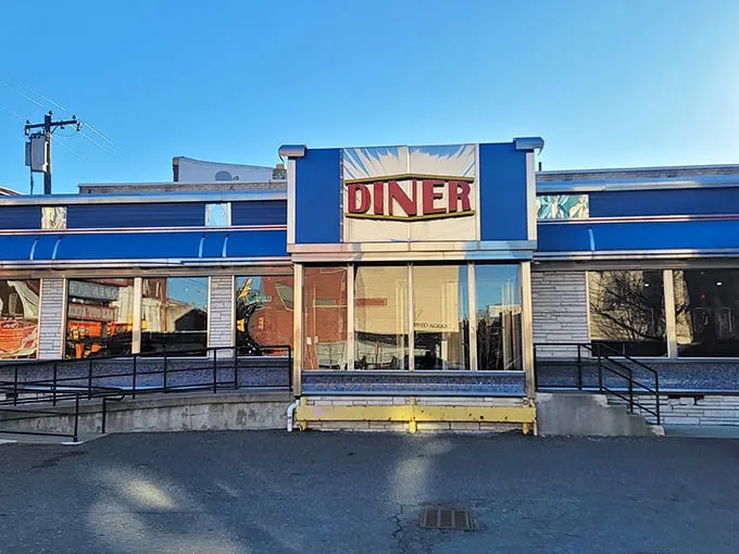 The iconic blue exterior of Broad Street Diner stands as a beacon of breakfast hope on Philadelphia's busy thoroughfare. Classic Americana at its finest.