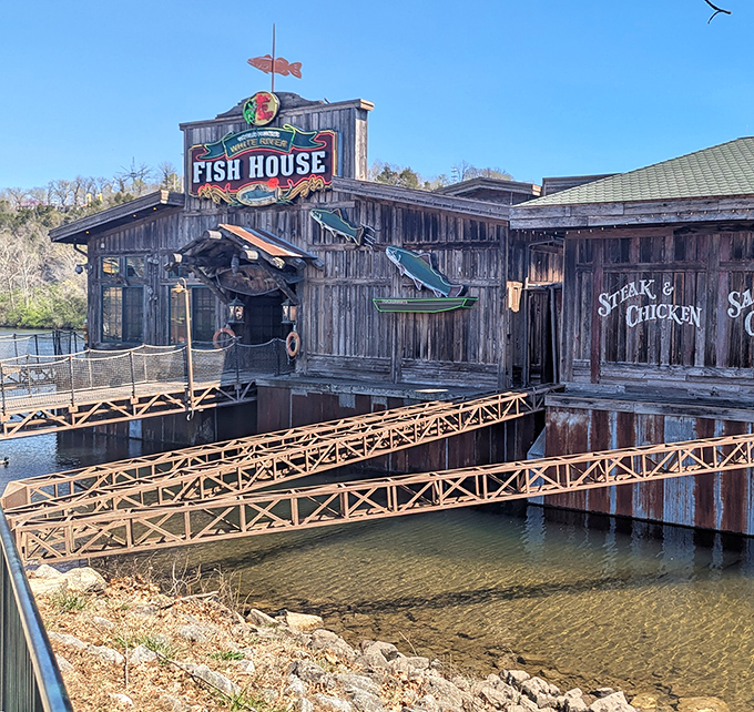 The rustic wooden exterior of White River Fish House beckons like an old friend, complete with that fish-shaped weather vane that seems to say "good catch inside!"