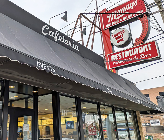 The iconic red neon sign against Chicago's skyline says it all – this is where sandwich legends are born and appetites meet their match.