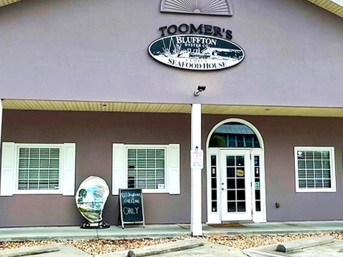 The unassuming exterior of Toomer's Bluffton Seafood House proves once again that culinary treasures often hide in plain sight. South Carolina's seafood secret awaits!