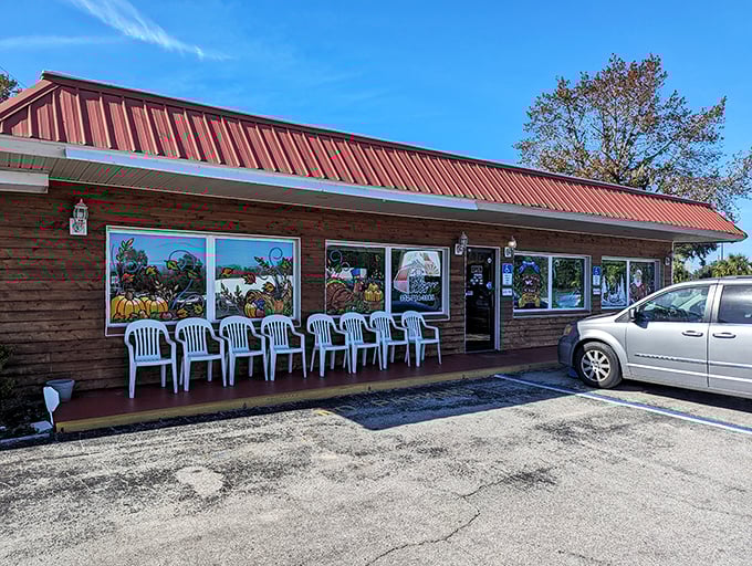 The rustic wooden exterior of The Biscuit Barn promises no pretension—just honest food that'll make your taste buds stand up and salute.