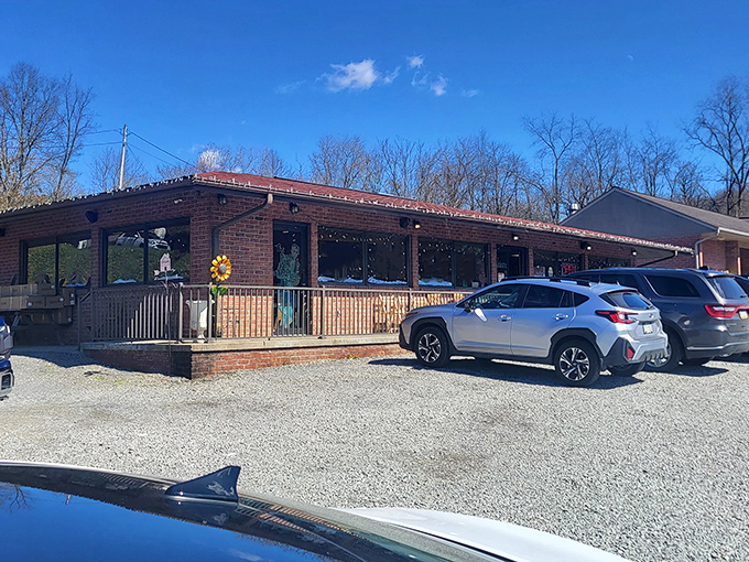 The iconic Deer Creek Diner sign stands as a beacon of breakfast hope along the roadside, promising comfort food salvation to hungry travelers.