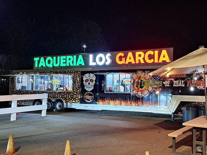 The colorful exterior of Los Garcia beckons hungry patrons with its vibrant sugar skull artwork and Mexican flag colors. Worth the wait in any weather!