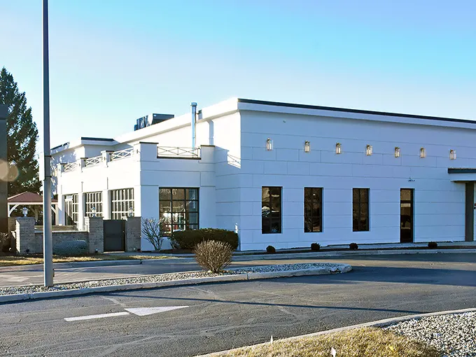 The unassuming white exterior of Darlene's is like a breakfast speakeasy – you'd never guess the flavor paradise waiting inside.