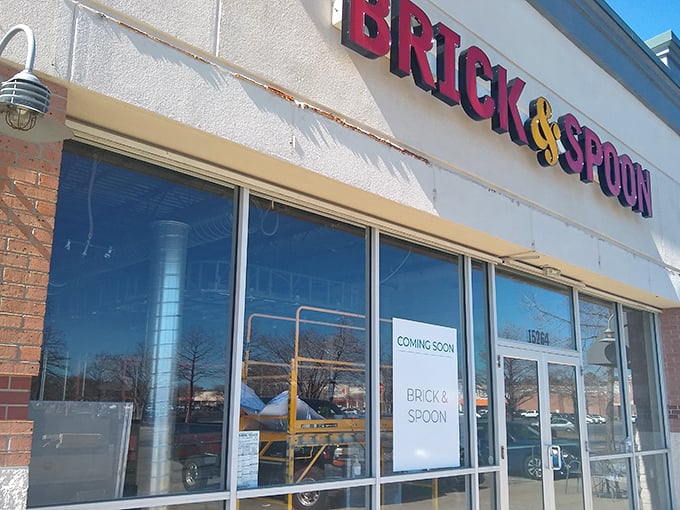 The unassuming storefront of Brick & Spoon might fool you, but those packed parking spaces tell the real story—breakfast treasures await inside.