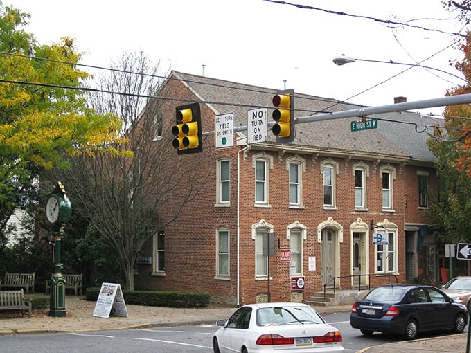 Historic brick buildings line Manheim's streets, where autumn leaves add splashes of gold to a scene that feels frozen in time yet wonderfully alive.