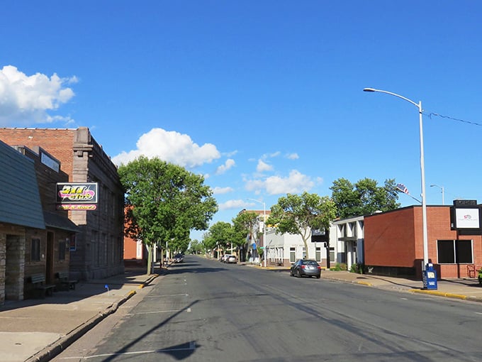 Ladysmith's main street offers that perfect small-town serenity where rush hour means three cars at the stop sign. Classic Americana preserved in brick and blue sky.