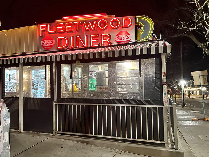 The iconic silver exterior of Fleetwood Diner gleams in the Michigan sunshine, a time capsule of Americana where hungry souls find refuge 24/7.