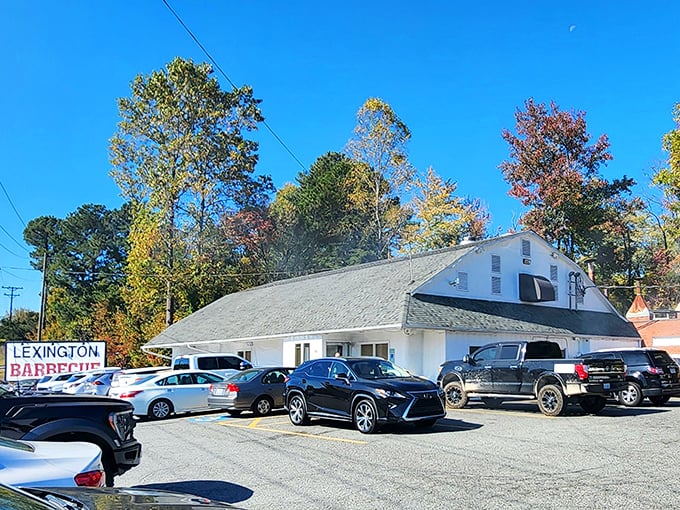 The neon-trimmed roofline glows like a barbecue beacon in the night, guiding hungry pilgrims to this temple of smoke and flavor.