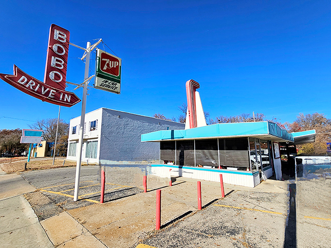 The iconic Bobo's sign stands tall against the Kansas sky, a neon beacon promising burger bliss to weary travelers.