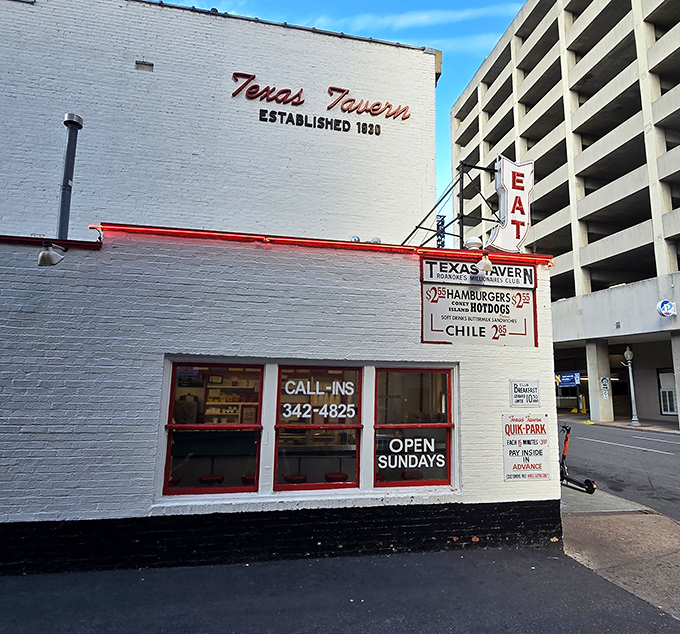 The white brick façade of Texas Tavern stands like a time capsule in downtown Roanoke, its vintage signage promising simple pleasures that never go out of style.