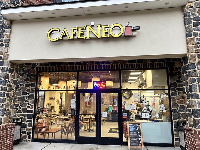 Cafeneo's stone-and-brick exterior isn't just another pretty facade—it's the gateway to cheesecake nirvana in Newark's bustling college district.