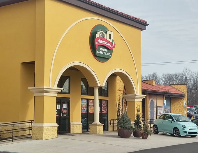 The golden arches of Italy beckon from suburban Pennsylvania—Altomonte's sunny façade promises Mediterranean treasures within those welcoming doors.