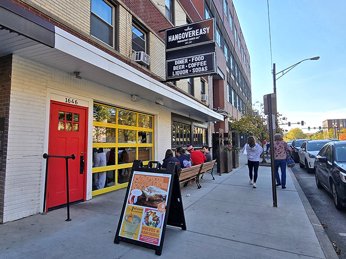 The bright red door and yellow windows of HangOverEasy aren't subtle—they're practically shouting "Wake up and get in here!" A colorful beacon for hungry Columbus souls.