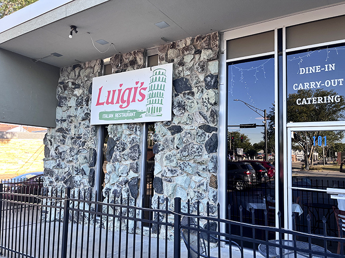 Luigi's stone facade creates that perfect "discovered gem" vibe, complete with the iconic Leaning Tower signage that promises authentic Italian flavors in Nebraska.