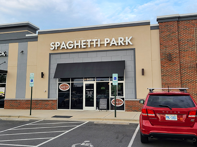 Spaghetti Park's unassuming exterior in Clemmons hides culinary treasures within—like finding an Italian masterpiece at your local strip mall.