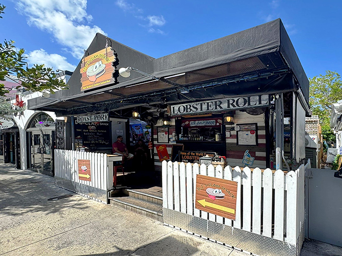 The white picket fence isn't keeping a secret—this tiny seafood haven on Duval Street has been discovered, and for good reason.