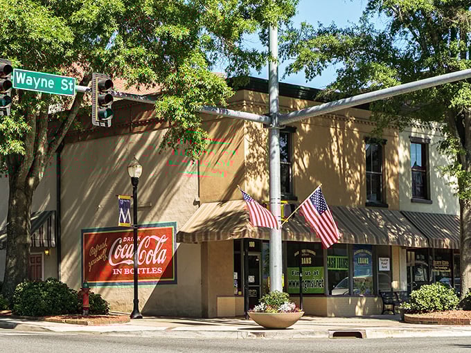 Downtown Milledgeville's vintage Coca-Cola sign isn't retro chic—it's the real deal, standing sentinel over Wayne Street like a carbonated time capsule.