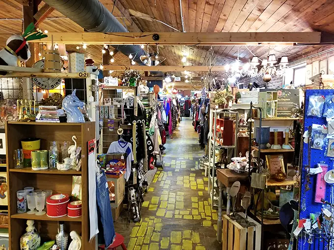 The iconic Conoco sign welcomes treasure hunters to this repurposed gas station, where seasonal decorations spill onto the porch like a festive welcome committee.