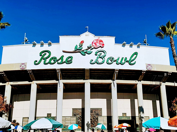 The iconic Rose Bowl sign welcomes treasure hunters to what might be the holy grail of flea markets. Those palm trees aren't just for show—they're witnesses to decades of haggling.