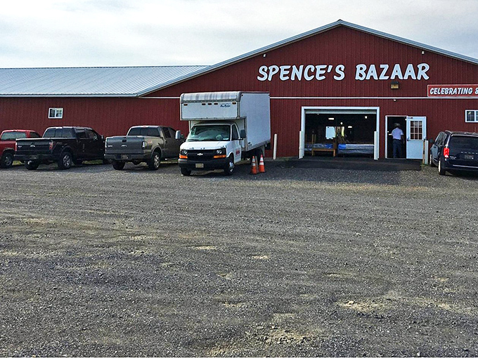 The iconic red barn of Spence's Bazaar stands like a beacon for treasure hunters—Delaware's very own retail Narnia behind those unassuming doors.
