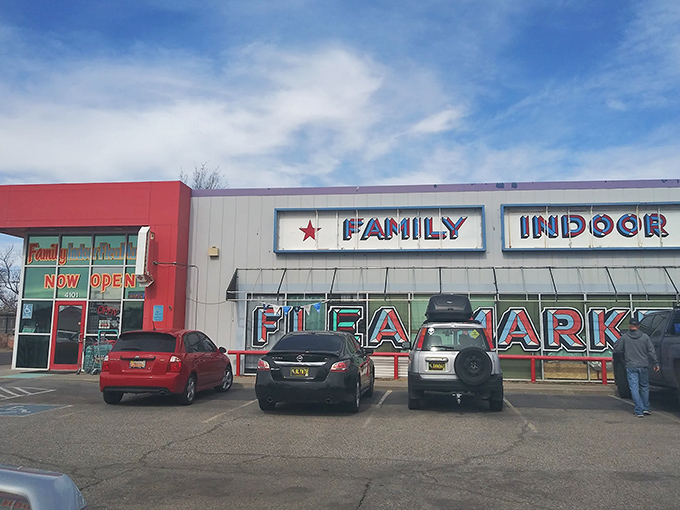 The red and white façade of Family Indoor Flea Market stands like a beacon for treasure hunters. Bargain paradise awaits behind those doors!