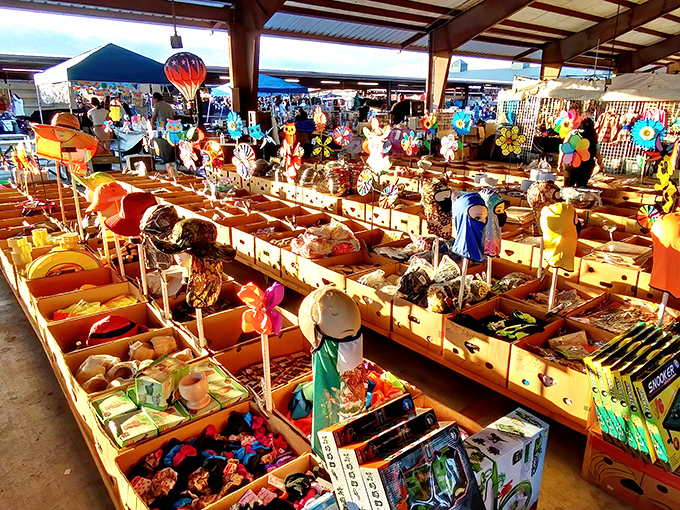 The vibrant food stalls at Traders Village pop with color against the Texas sky, promising flavors as bold as their paint jobs.