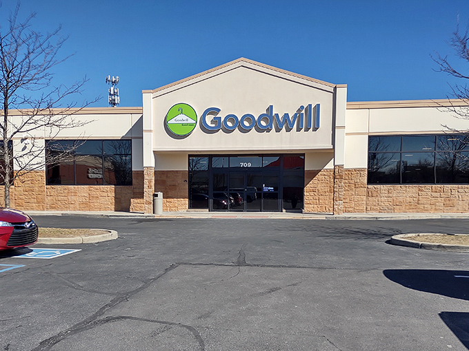 The unassuming exterior of Greenwood's Goodwill hides a treasure trove within, like finding a secret passage to bargain paradise.