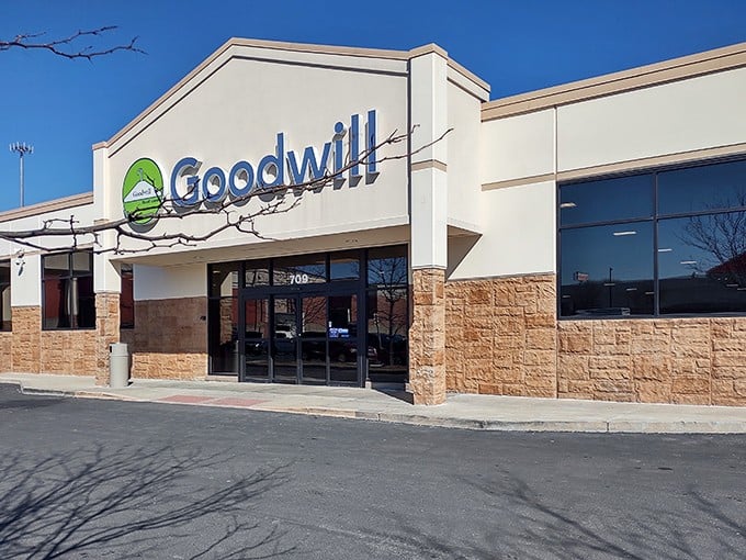 The unassuming exterior of Greenwood's Goodwill hides a treasure trove within, like finding a secret passage to bargain paradise.