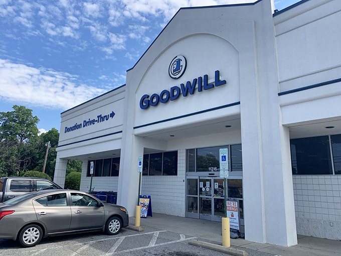 The gleaming white façade of Archdale's Goodwill beckons like a bargain-hunter's North Star, promising treasures within that won't break the bank.