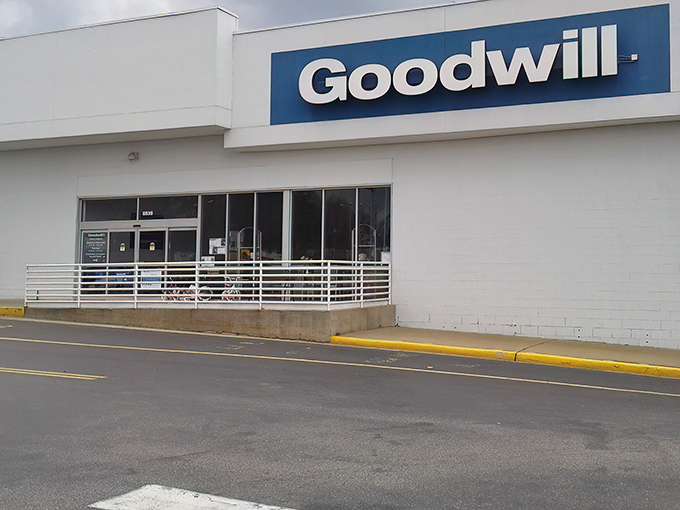 The unassuming exterior belies the treasure trove within. Like a Vegas casino, this Goodwill Outlet keeps its best secrets hidden behind a modest facade.
